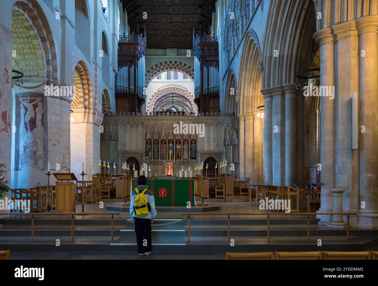 Al;tar and medieval nave screen with sculptures depicting the martyrs ...