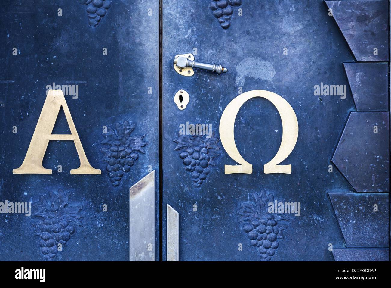 Alpha and Omega, relief with grapes, church gate of Kitzeck parish ...