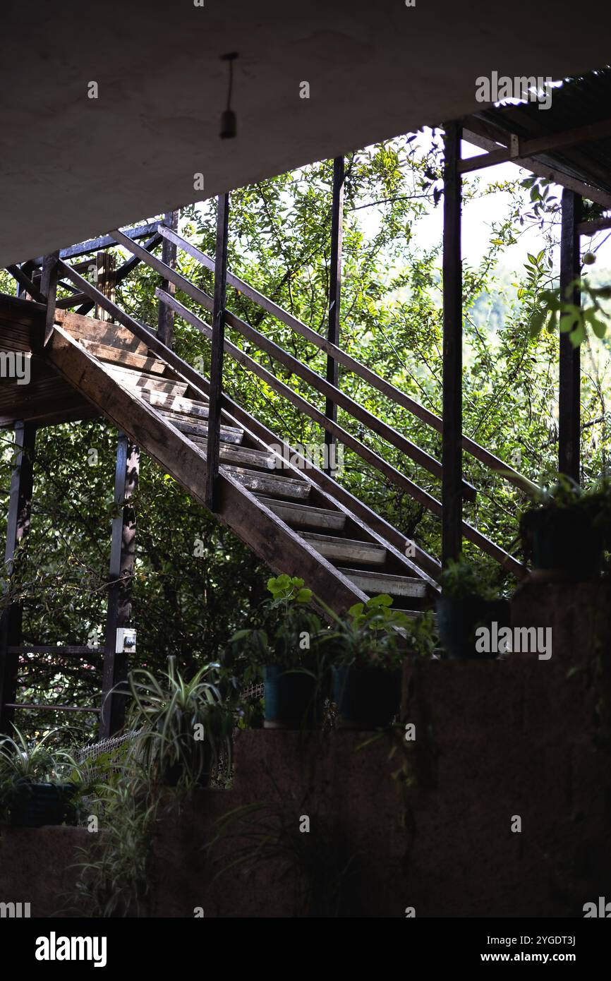 Wooden staircase from the second floor to the first floor hi-res stock ...