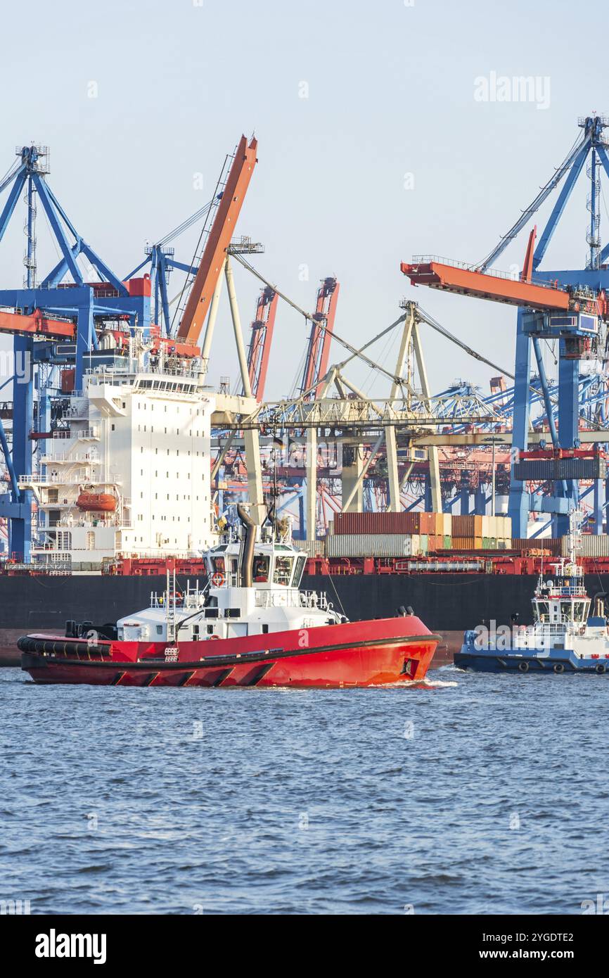 Closeup of the Hamburg harbor with container terminal and tug in the ...