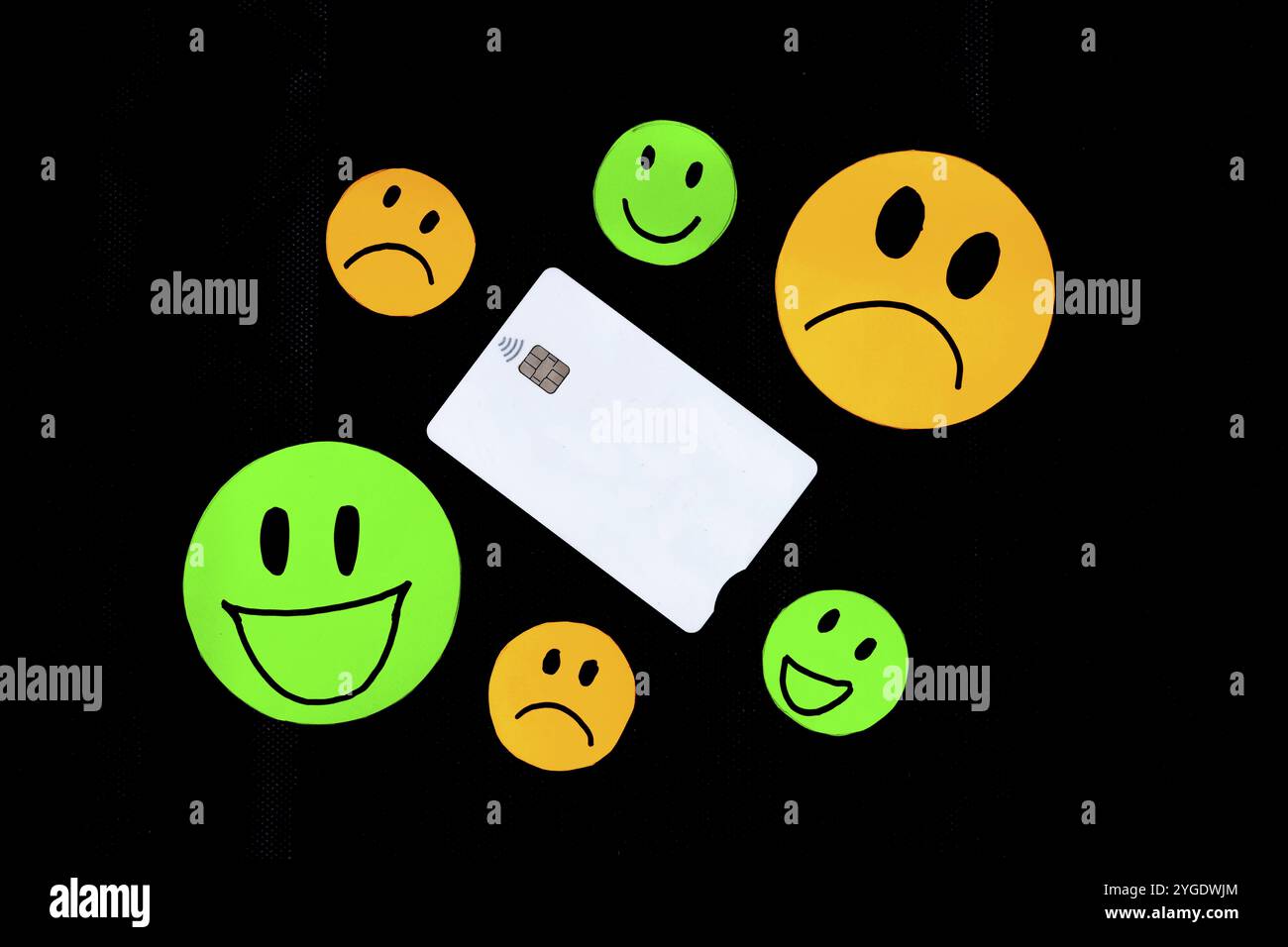 A white plastic card with a chip with contactless payment technology ...