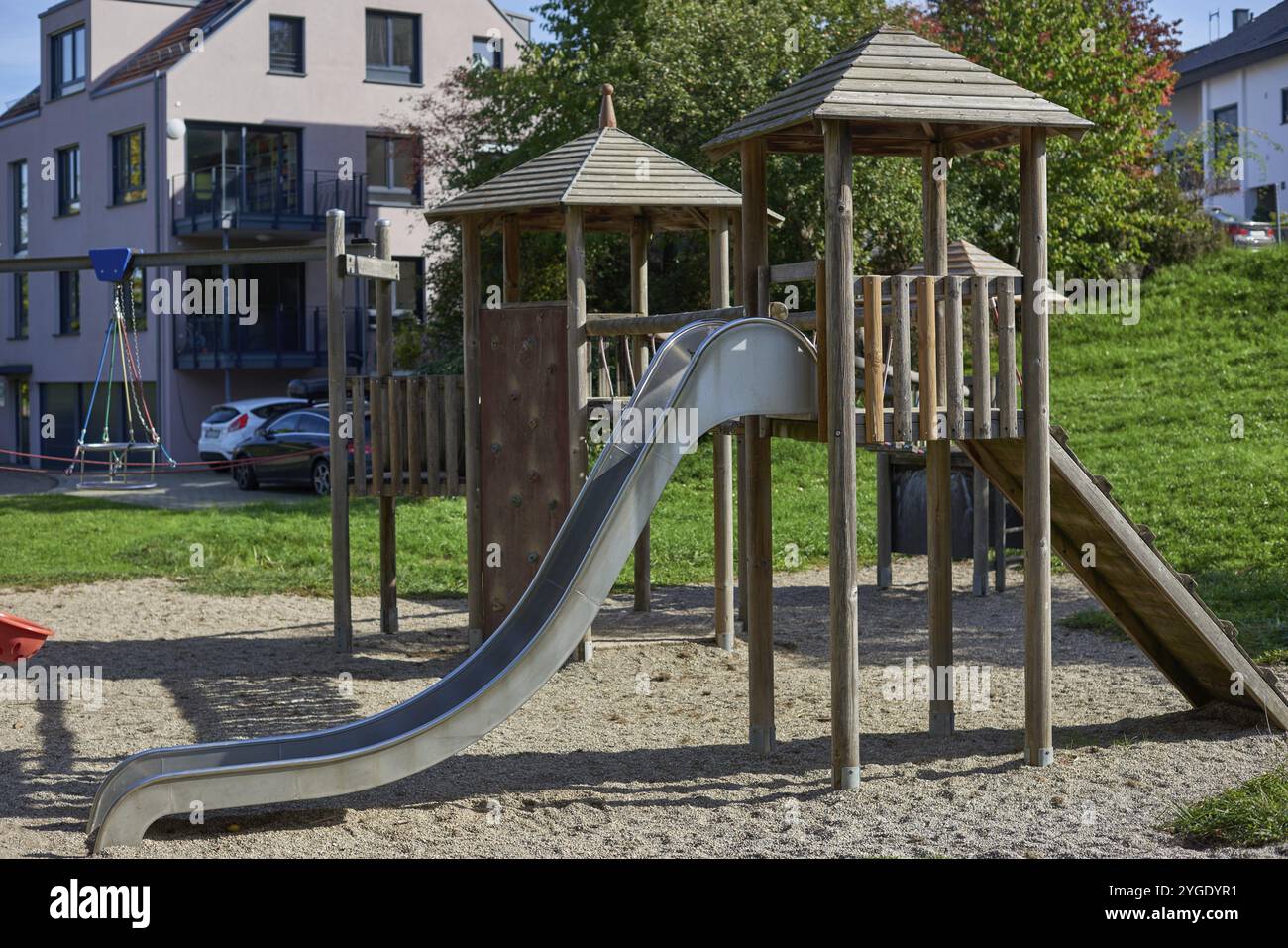 Children Playground with Modern Slide, Rope Net Bridge, Climbing Swings ... Children Playground with Modern Slide, Rope Net Bridge, Climbing Swings ...