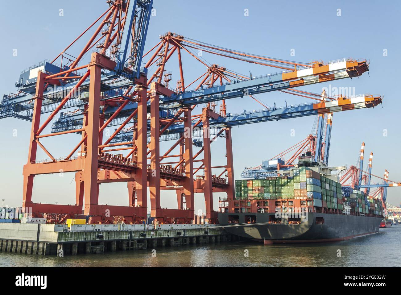 Large container vessel and harbour facilities at a container terminal ...