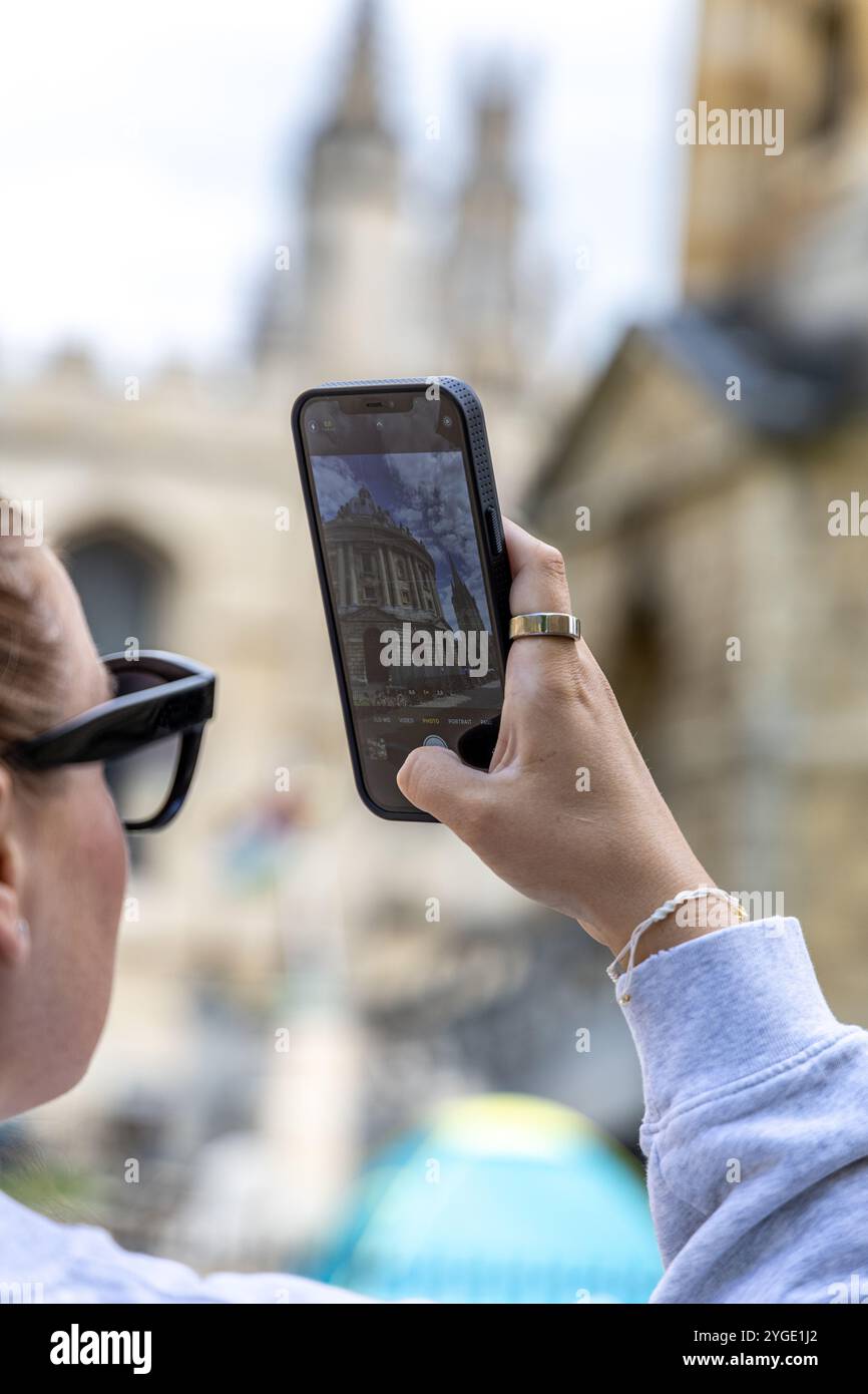 Oxford , UK - June 5, 2024: Taking picture on mobile phone of Oxford ...