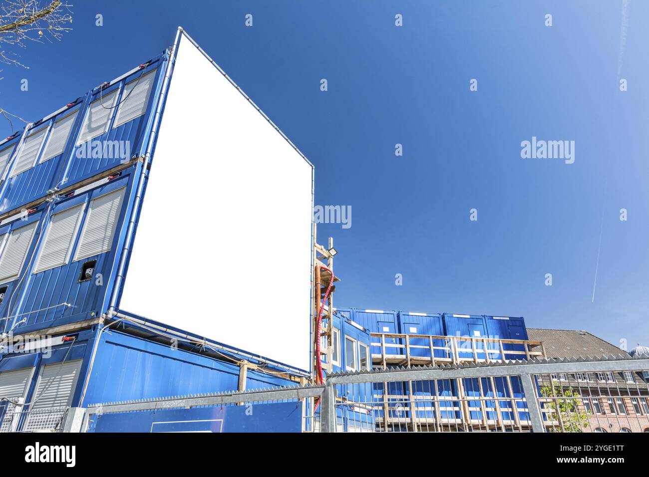 Blank sign on construction site with container homes Stock Photo - Alamy