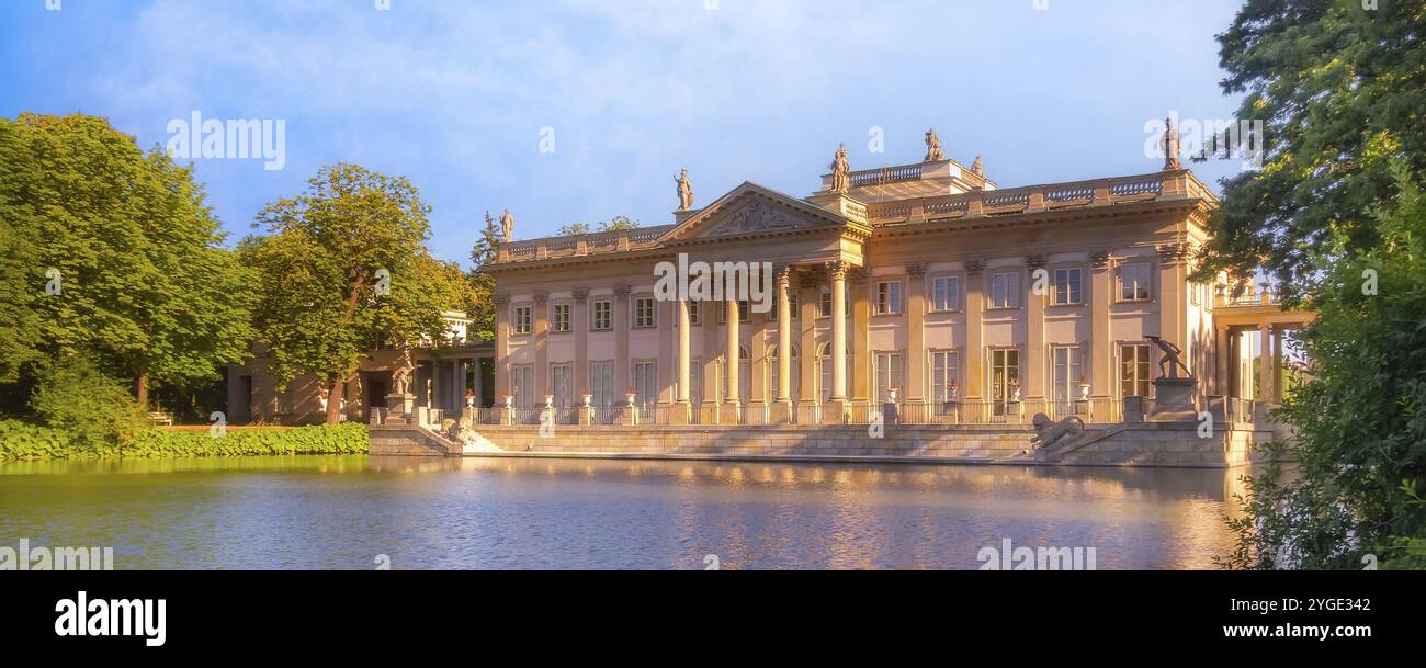 Poland, Warsaw. Lazienki palace with reflection in pond water in the ...