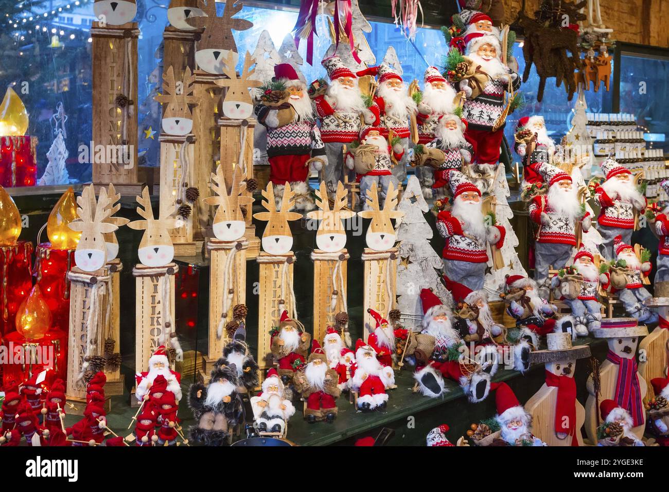 Christmas market stall with Santa Claus gifts and souvenirs for sale in ...