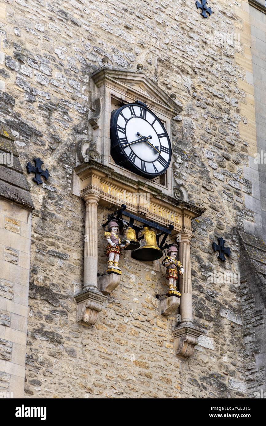 Oxford , UK - June 5, 2024: St Martin's Tower clock, also called Carfax ...