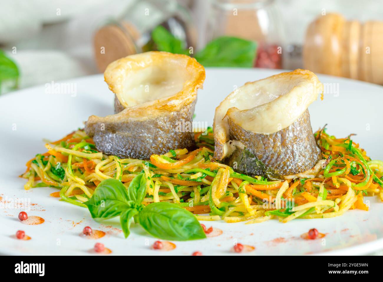 fried fish fillet and vegetables Stock Photo - Alamy
