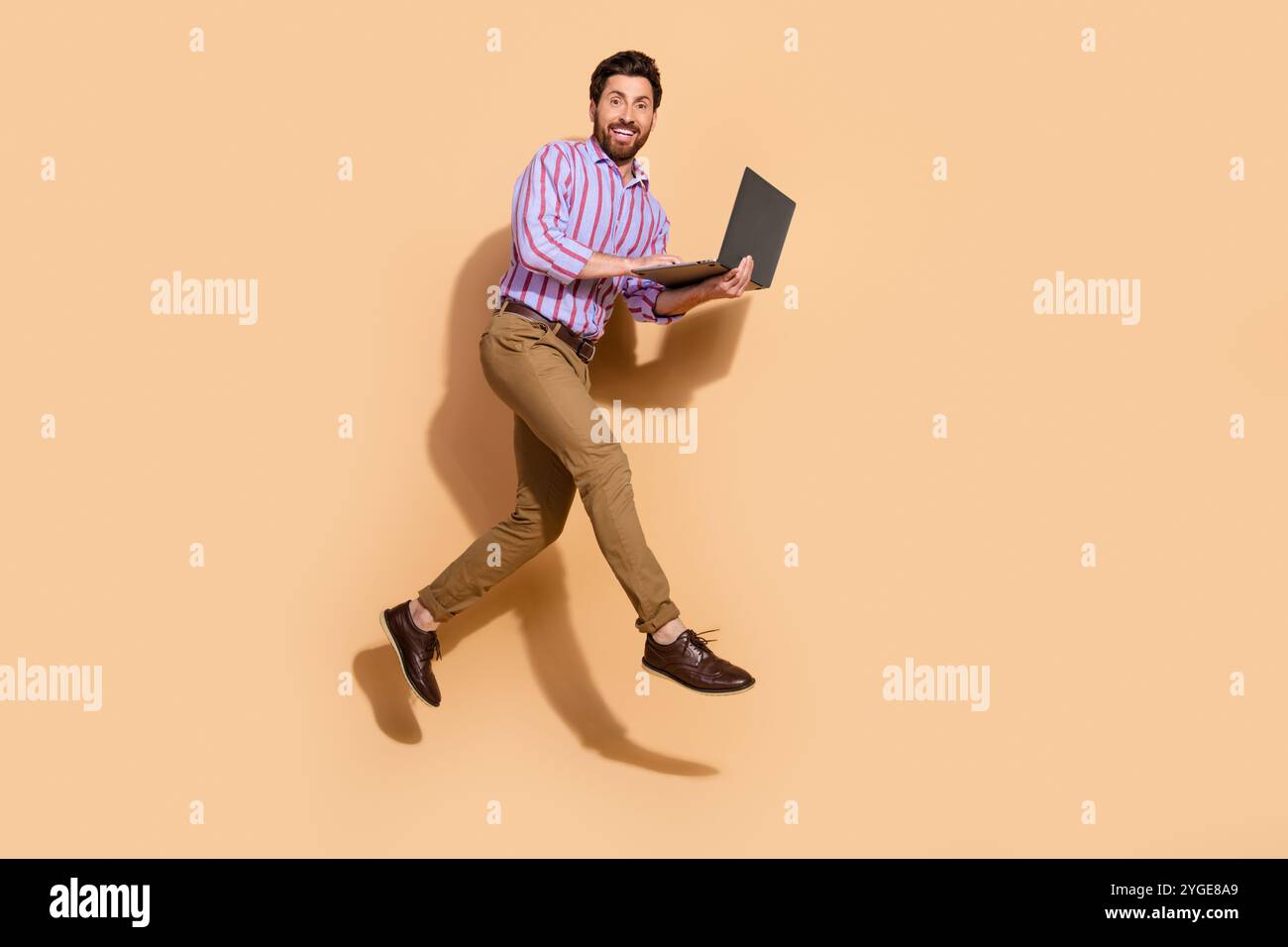 Photo of brunet hair adult jumping manager man running when holding ...