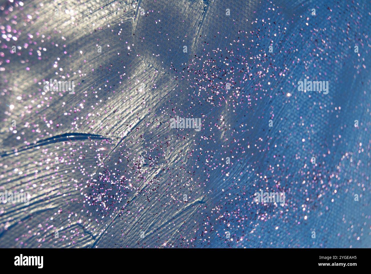 Shiny blue and silver acrylic layers add a frosty, glittery touch to ...