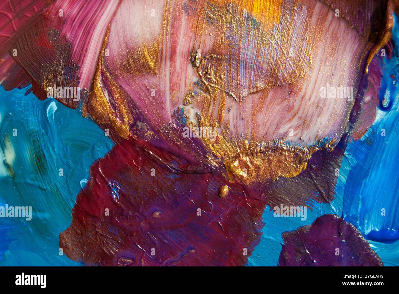 Abstract background with vibrant, shiny acrylic paint strokes in a mix ...