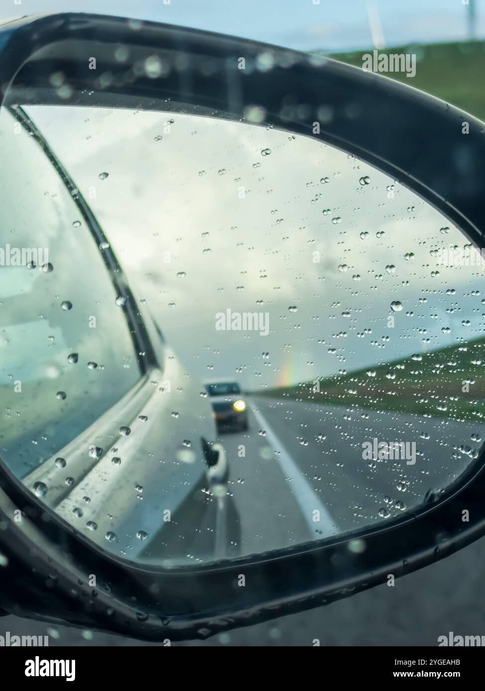 Rearview mirror car in rainy hi-res stock photography and images - Alamy
