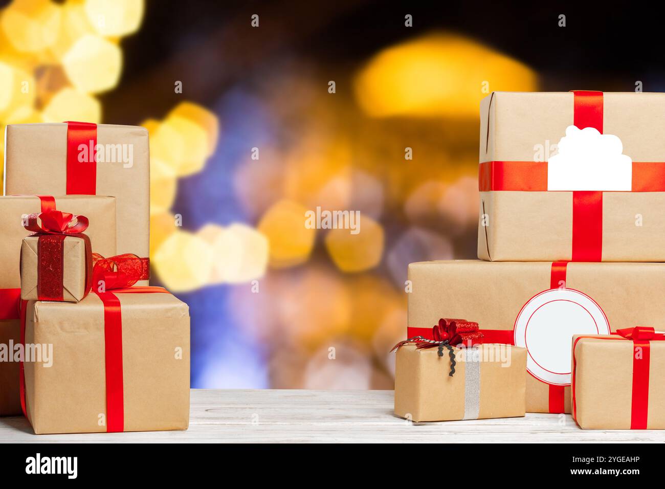 pile of gifts on the old table Stock Photo - Alamy
