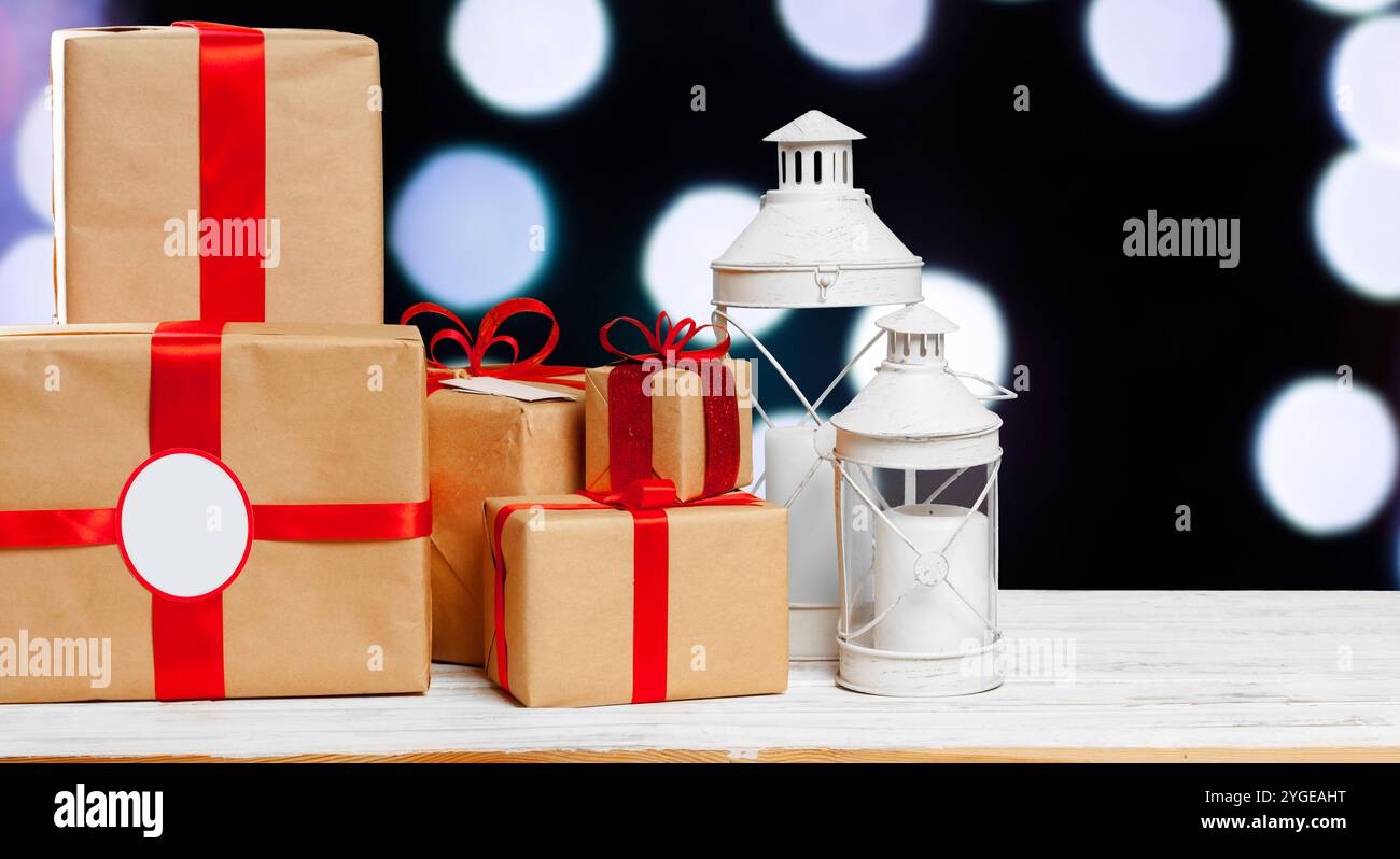 pile of gifts on the old table Stock Photo - Alamy