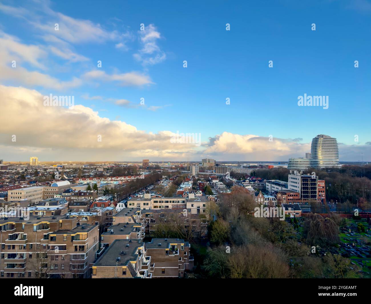 A clear autumn skyline of Groningen, featuring crisp blue skies above ...