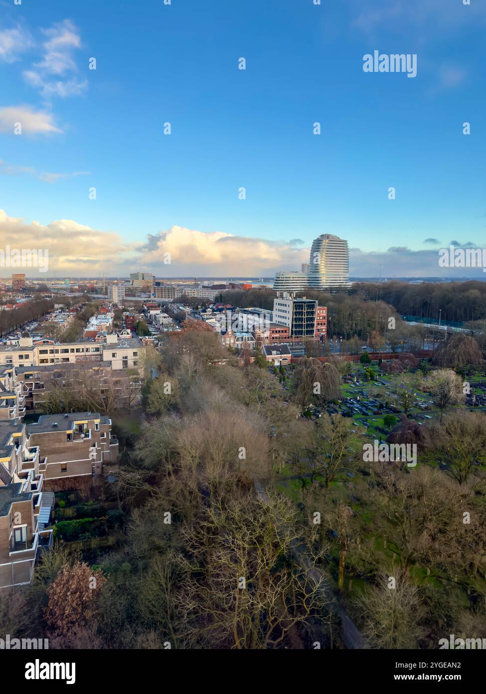 A clear autumn skyline of Groningen, featuring crisp blue skies above ...