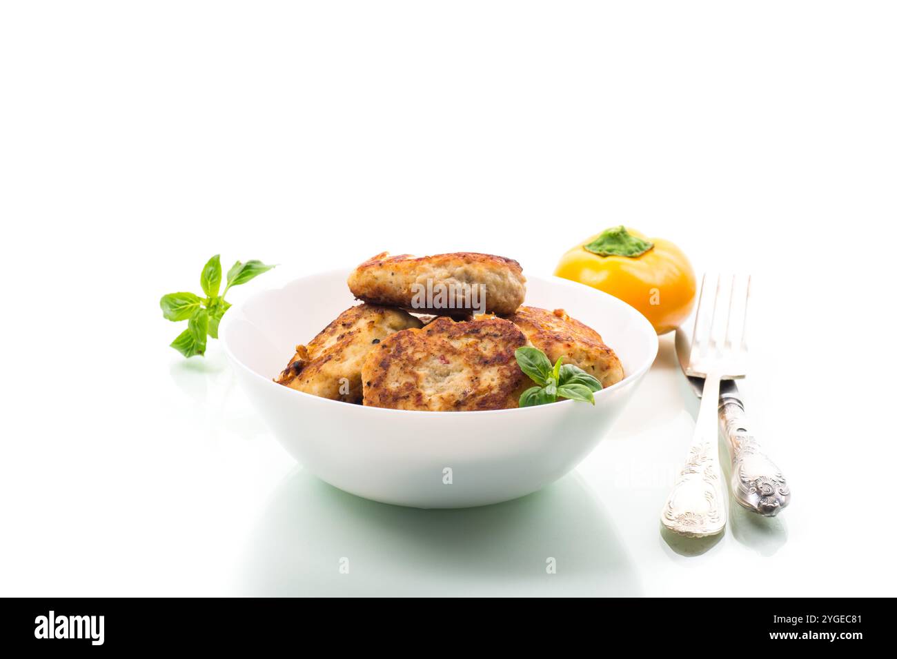 fried chicken cutlets in a bowl, isolated on white background Stock ...