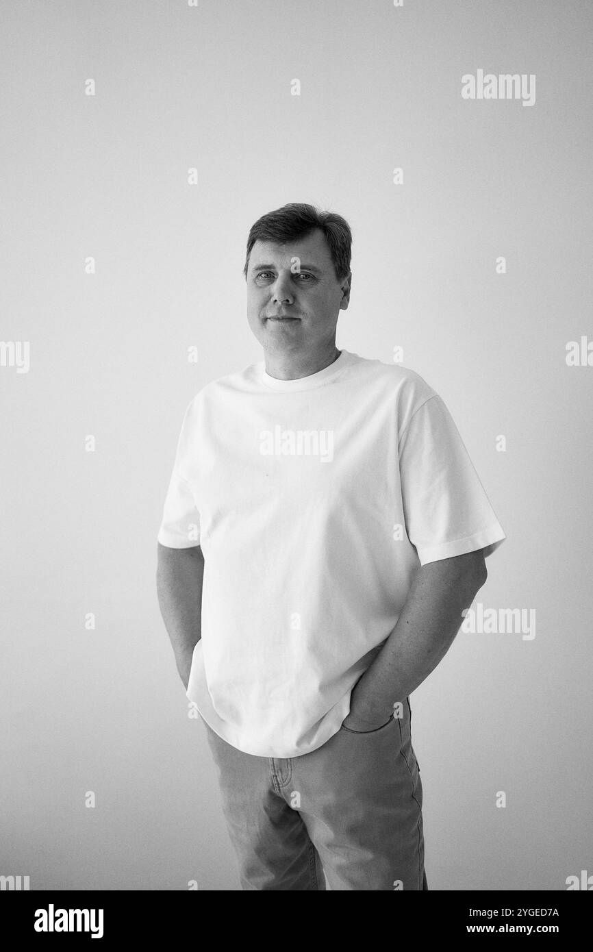 a portrait of a middle-aged man on a white background Stock Photo - Alamy