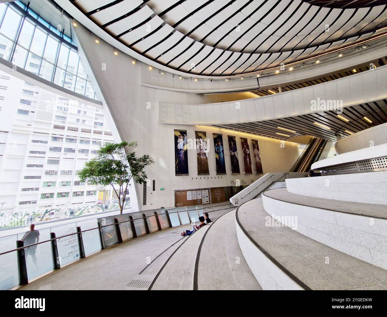 The image captures the interior of the Xiqu Centre in Hong Kong, a ...
