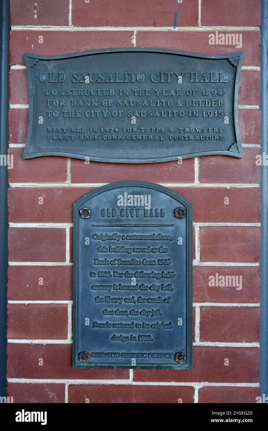 Information plaque re Old Sausalito City Hall on a red brick wall Stock ...