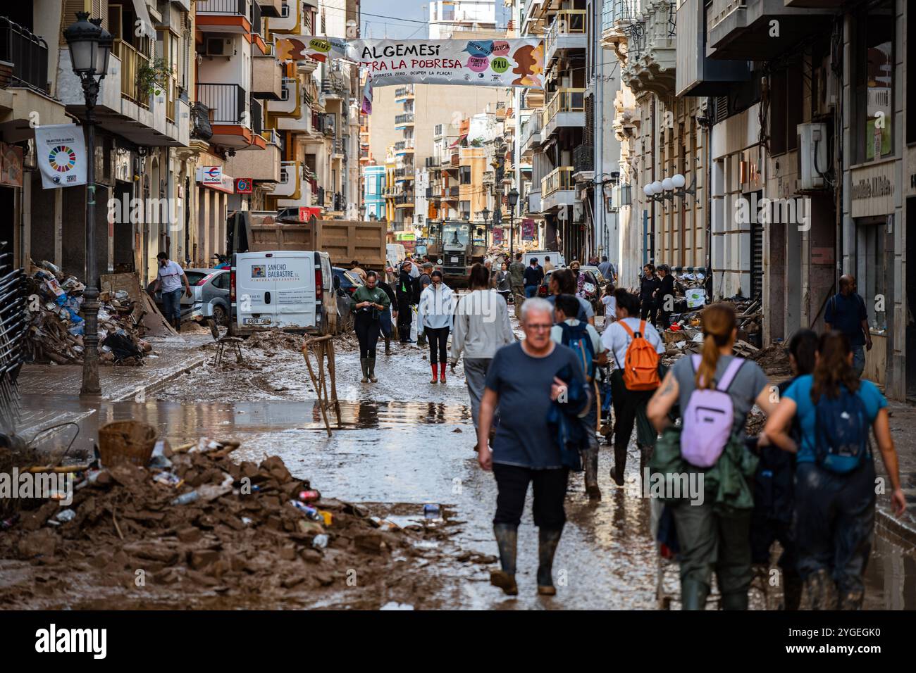 Aftermath of floods in Valencia, Spain People walk on a damaged and ...