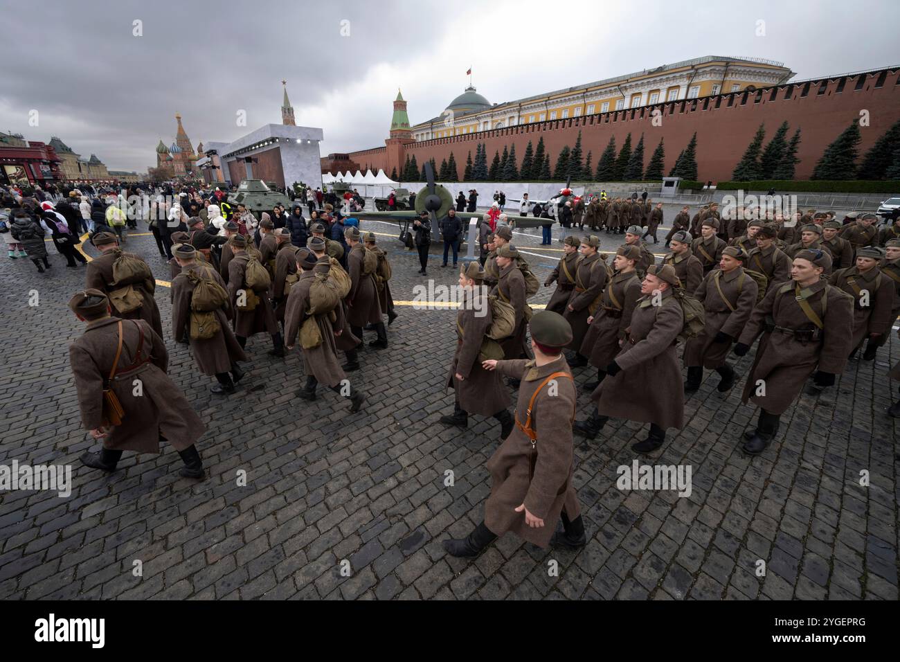 People wearing Soviet military uniform of the WWII march during an open ...