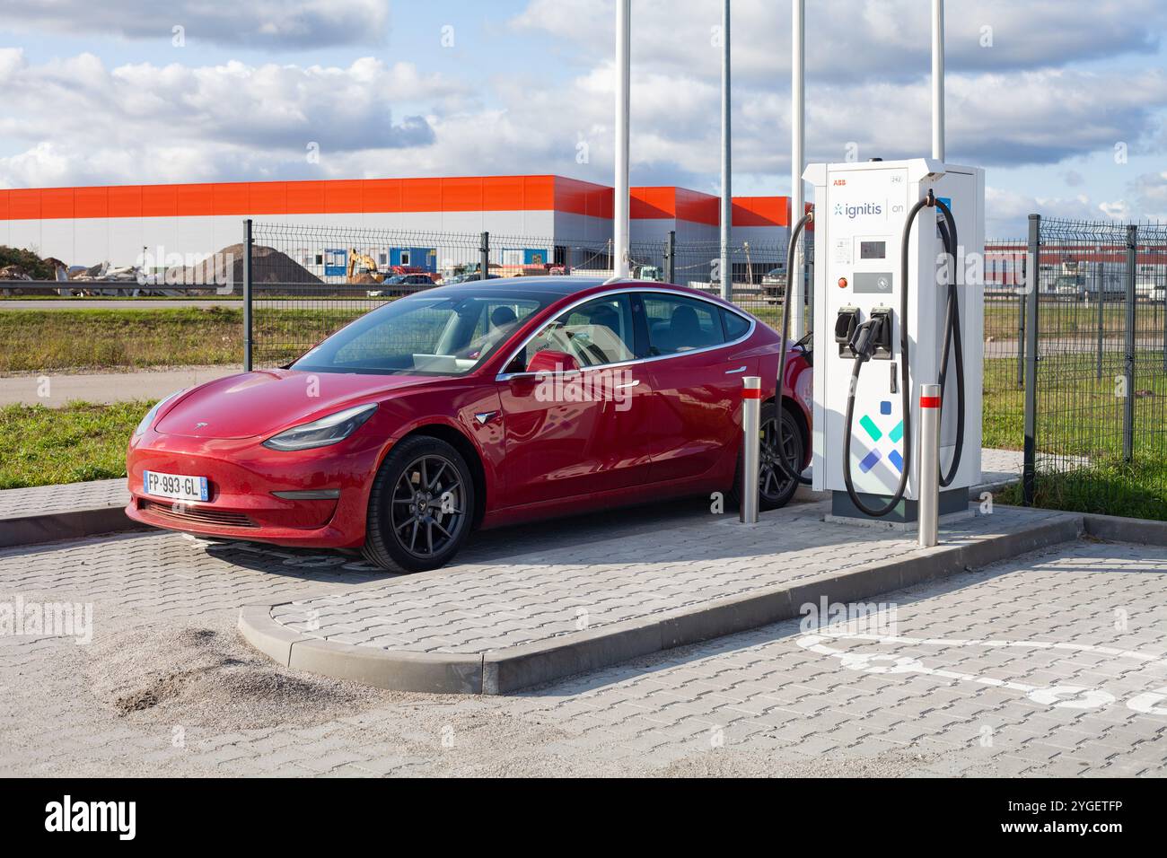 Red electric Tesla Model 3 Dual Motor Lons range at the Ignitis ON ...