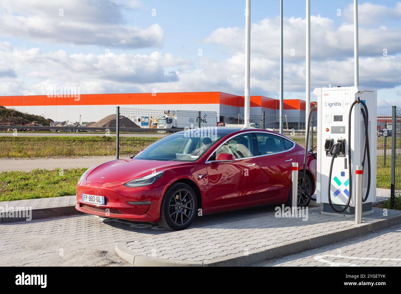 Red electric Tesla Model 3 Dual Motor Lons range at the Ignitis ON ...