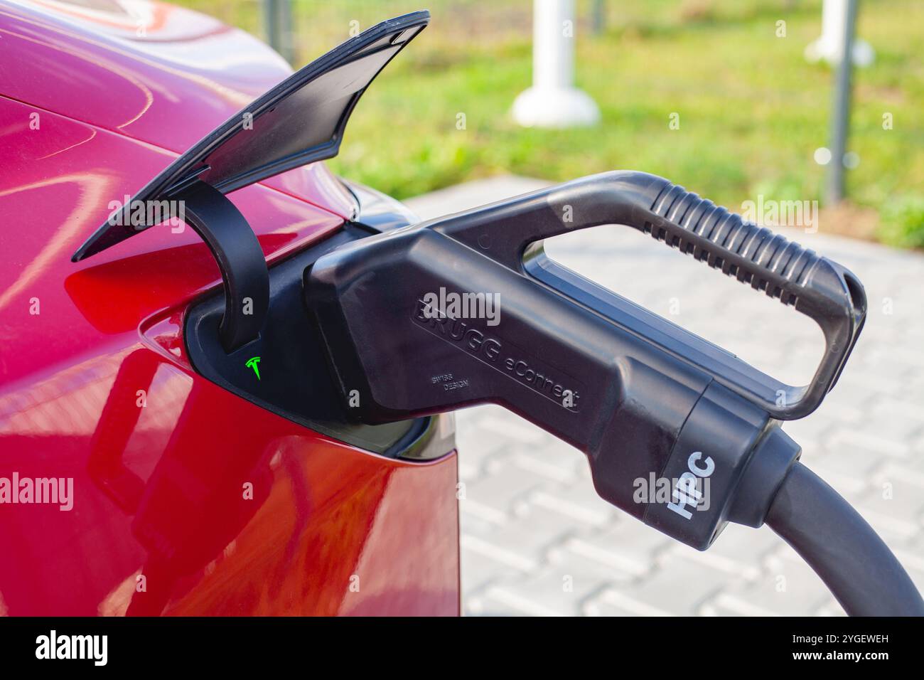 Red full electric american car Tesla Model 3 Dual Motor has fast ...