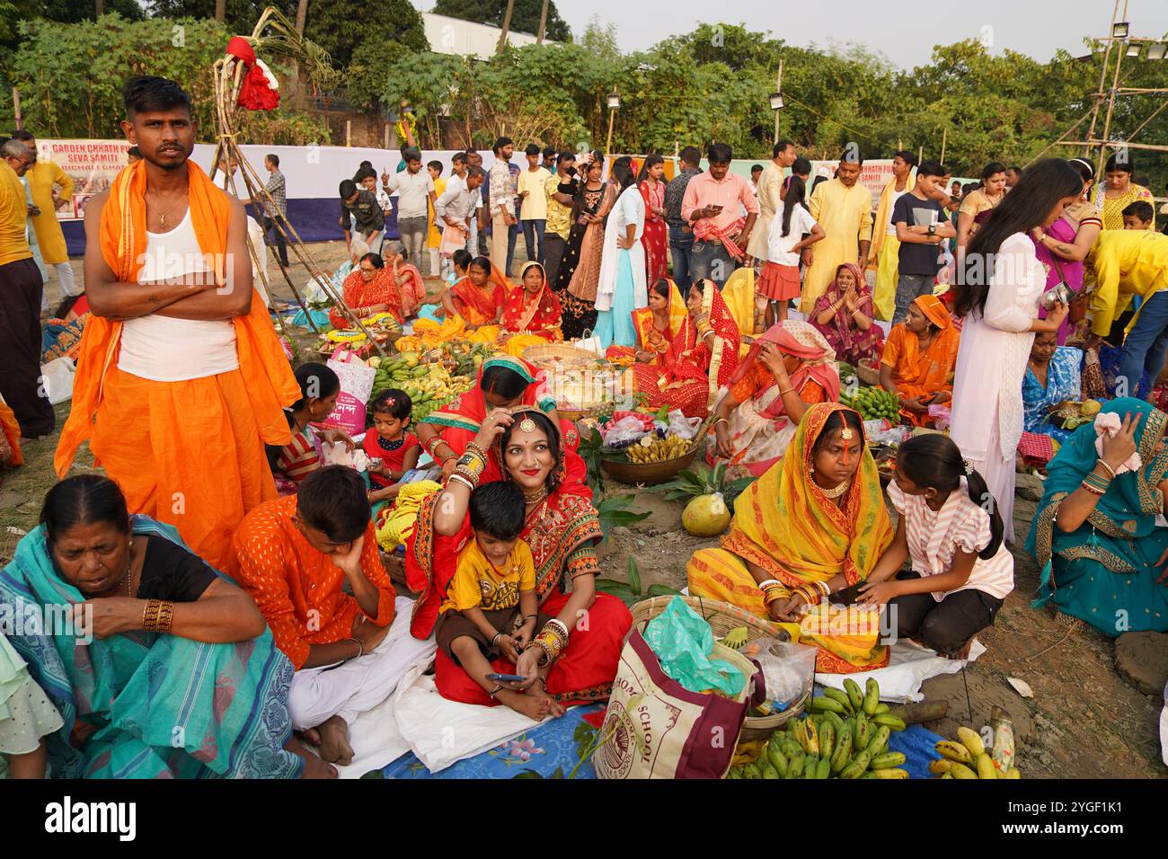 Kolkata, India - Nov 7, 2024: Hindu devotees gathered along the Hooghly River in Kolkata at dusk ...