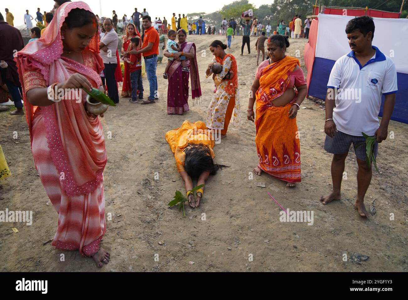 Kolkata, India - Nov 7, 2024: Hindu devotees gathered along the Hooghly ...