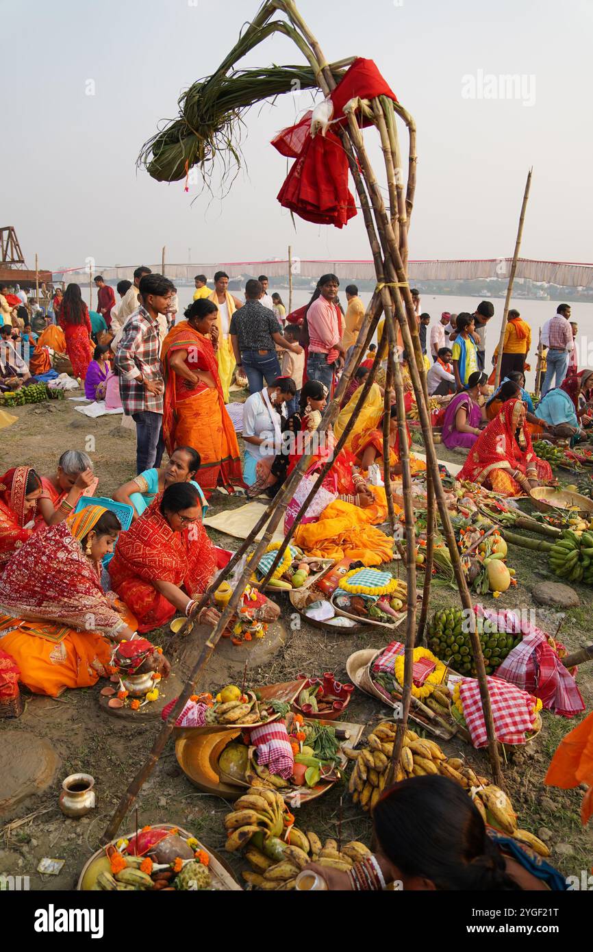 Kolkata, India - Nov 7, 2024: Hindu devotees gathered along the Hooghly ...