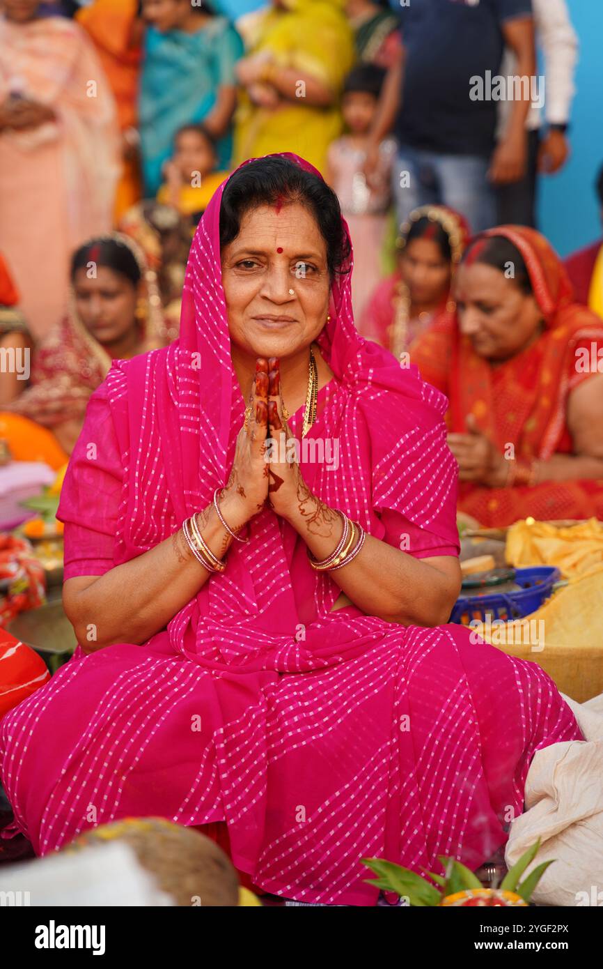 Kolkata, India - Nov 7, 2024: Hindu devotees gathered along the Hooghly ...