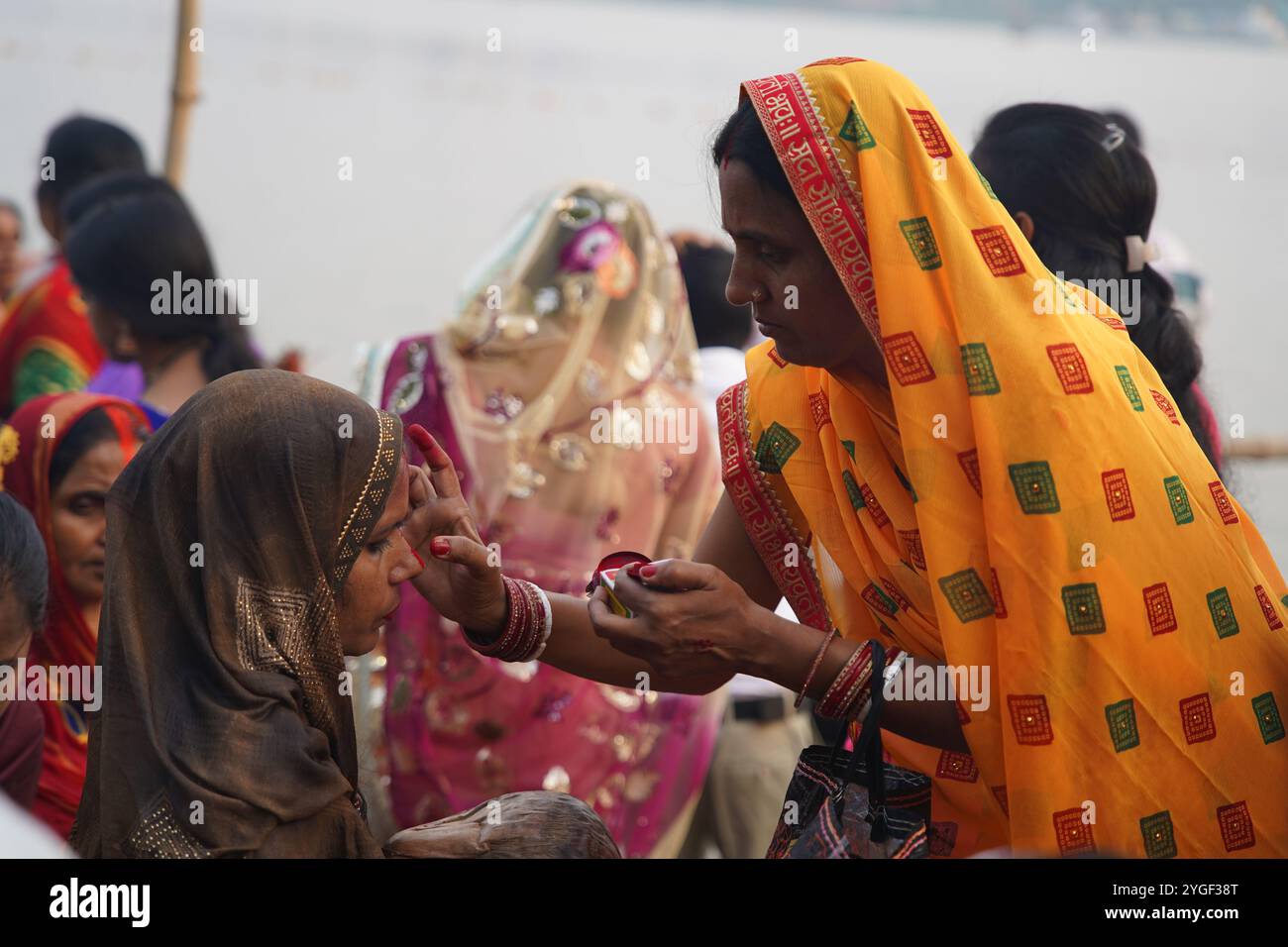 Kolkata, India - Nov 7, 2024: Hindu devotees gathered along the Hooghly ...