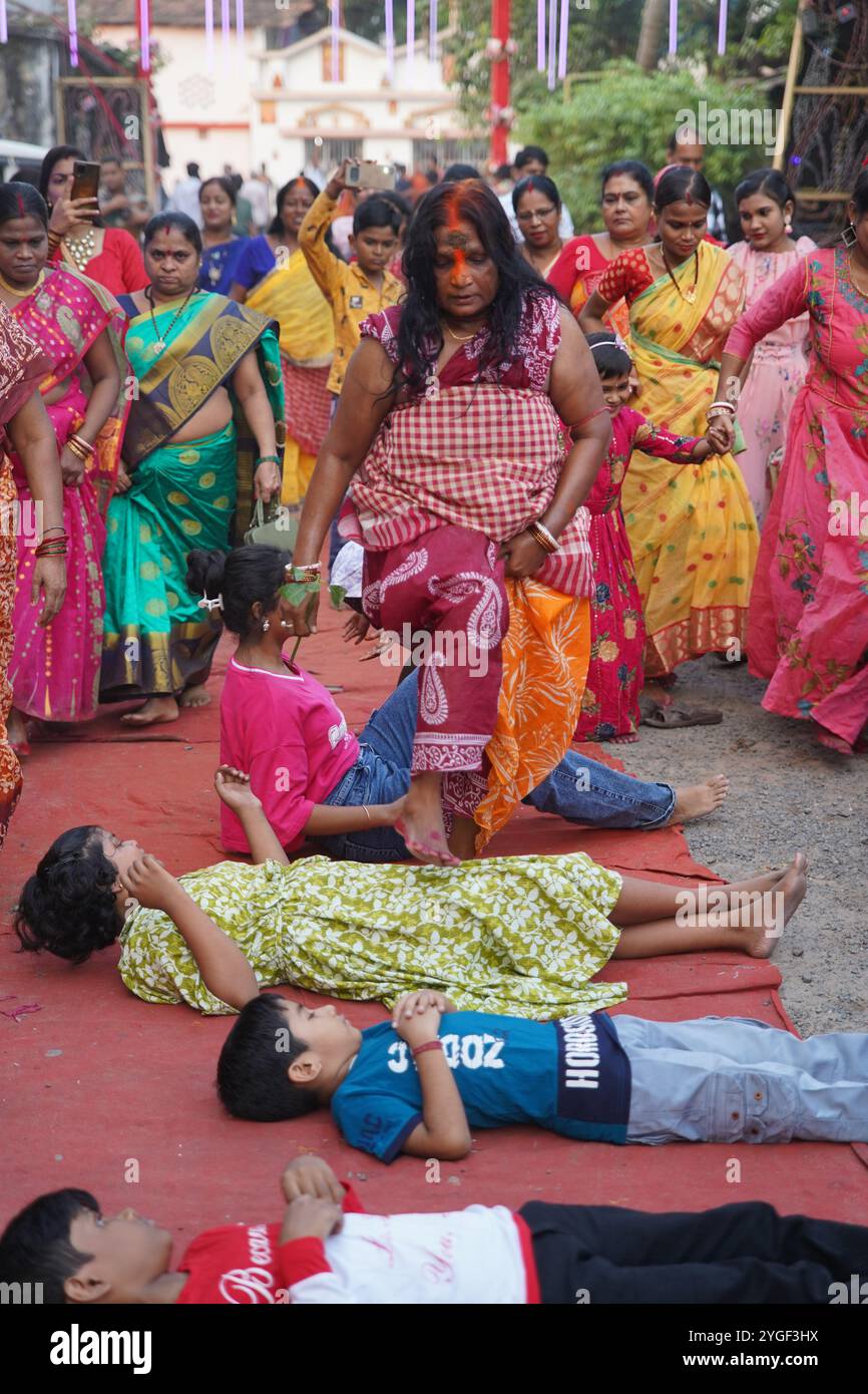 Kolkata, India - Nov 7, 2024: Hindu devotees gathered along the Hooghly ...