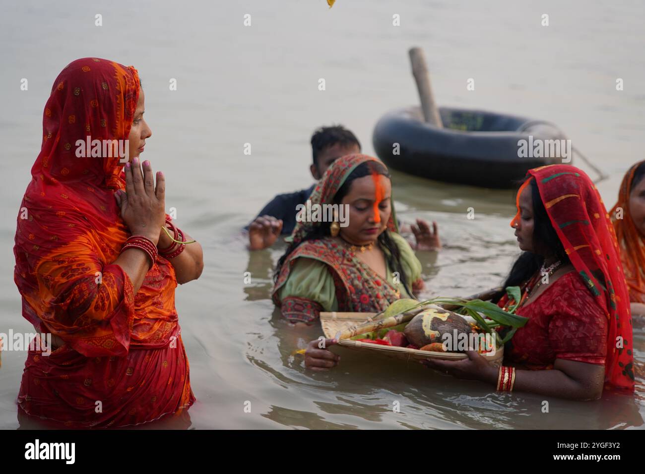 Kolkata, India - Nov 7, 2024: Hindu devotees gathered along the Hooghly ...