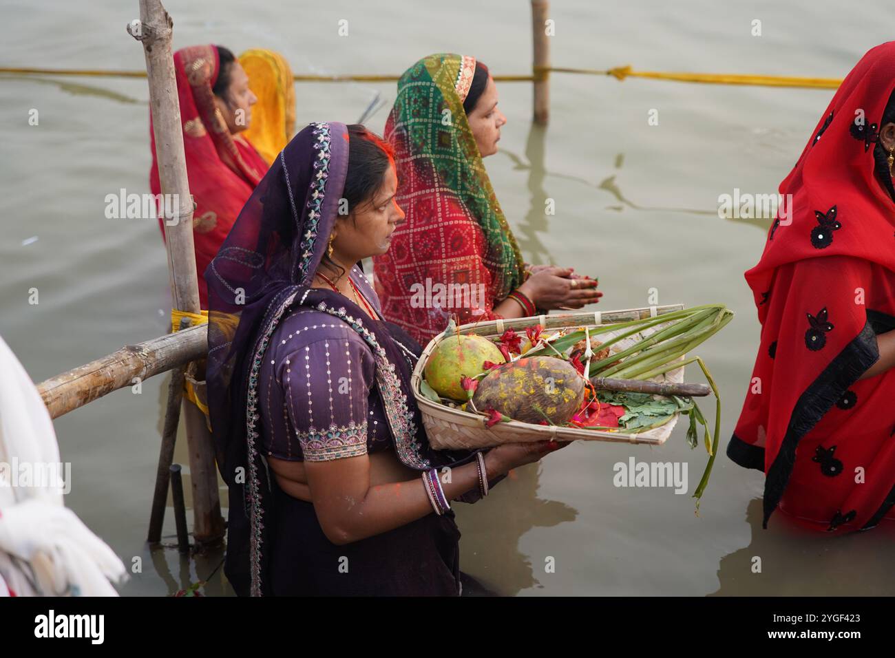 Kolkata, India - Nov 7, 2024: Hindu devotees gathered along the Hooghly ...