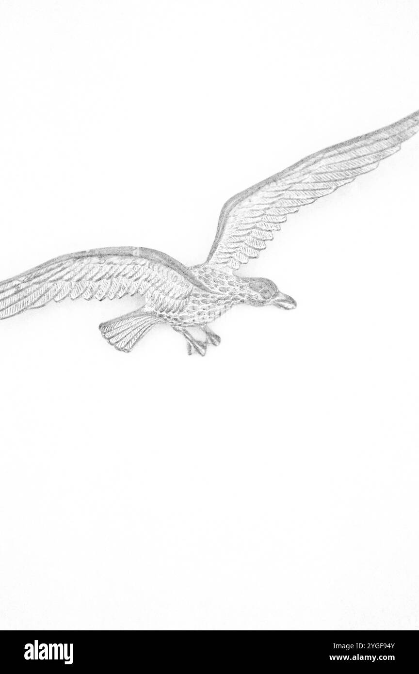 Sketchy pencil like image of model of seagull or eagle about to descend ...