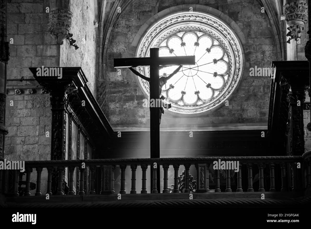 Sun Shining Through A Round Window At The Crucified Christ In An Medieval Church Europe Stock