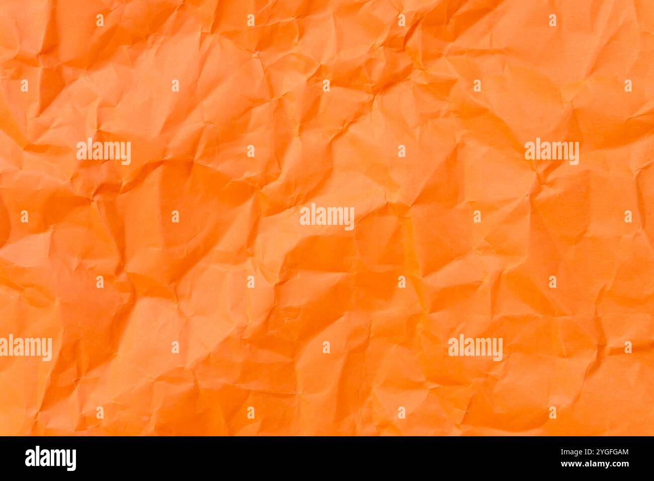 Top view and full frame of wrinkled or crumpled orange paper is used as ...