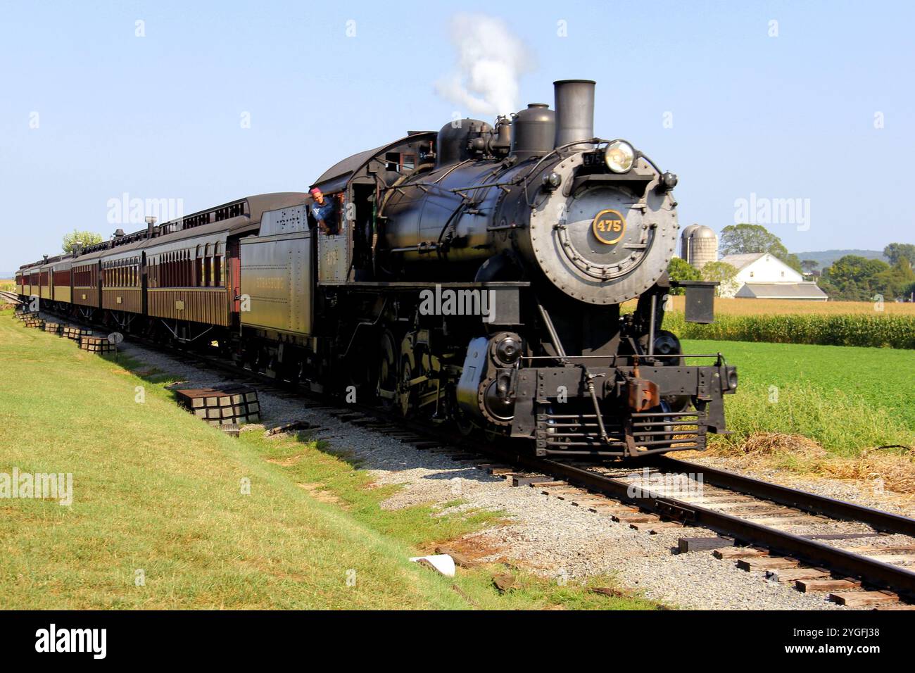 Historic steam locomotive pulling a train on Strasburg Rail Road, part ...