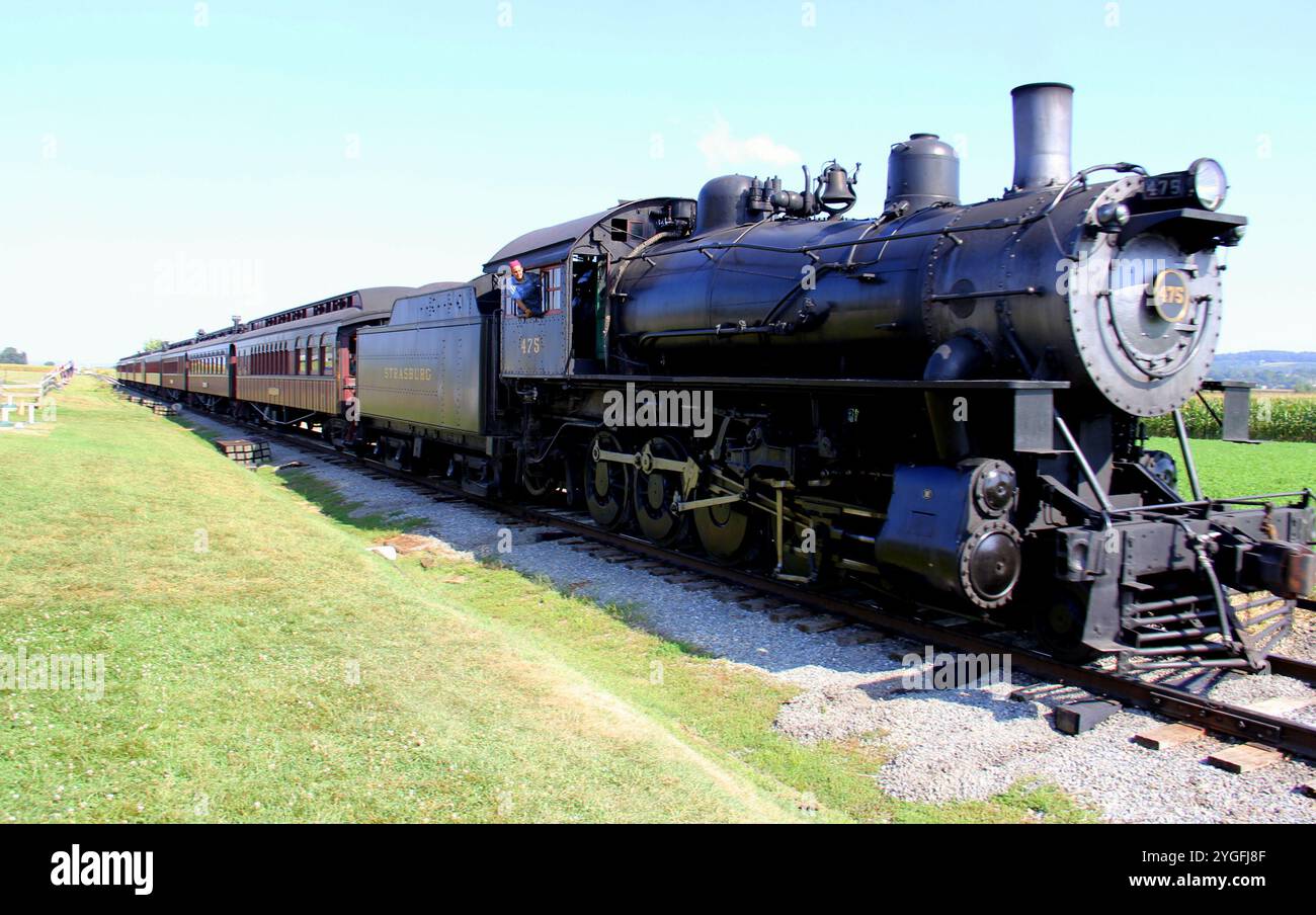 Historic steam locomotive pulling a train on Strasburg Rail Road, part ...