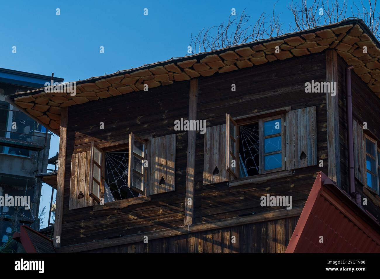 Upside-Down Wooden House: A Sunlit Tourist Attraction with Open Windows ...