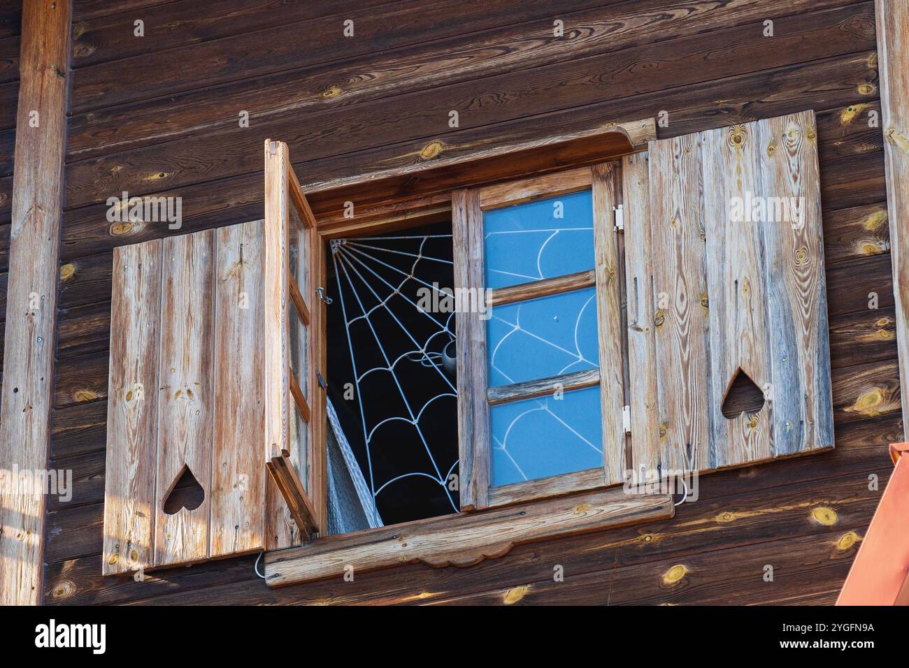 Upside-Down Wooden House: A Sunlit Tourist Attraction with Open Windows ...