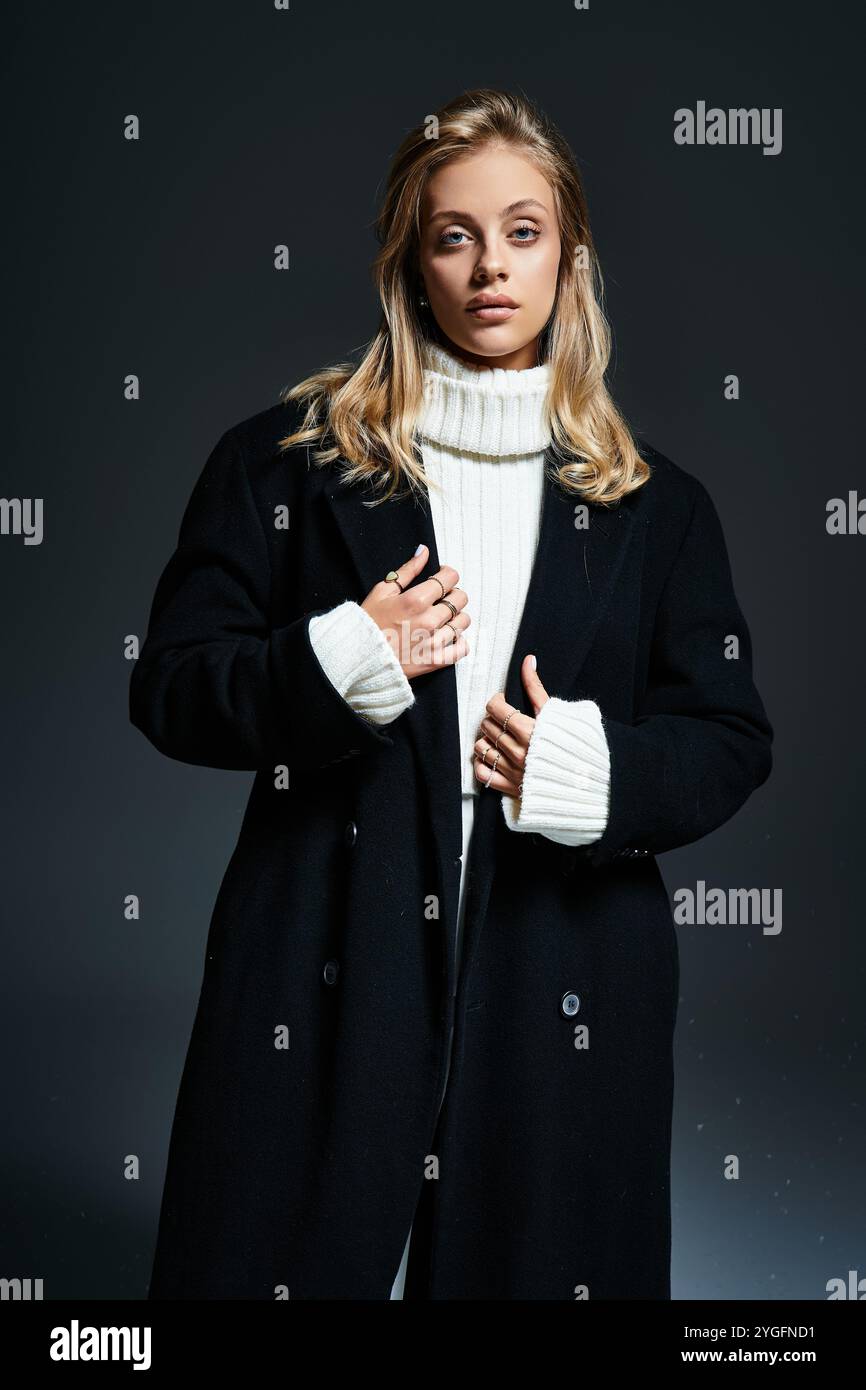 The young woman exudes confidence and grace while standing poised in a ...