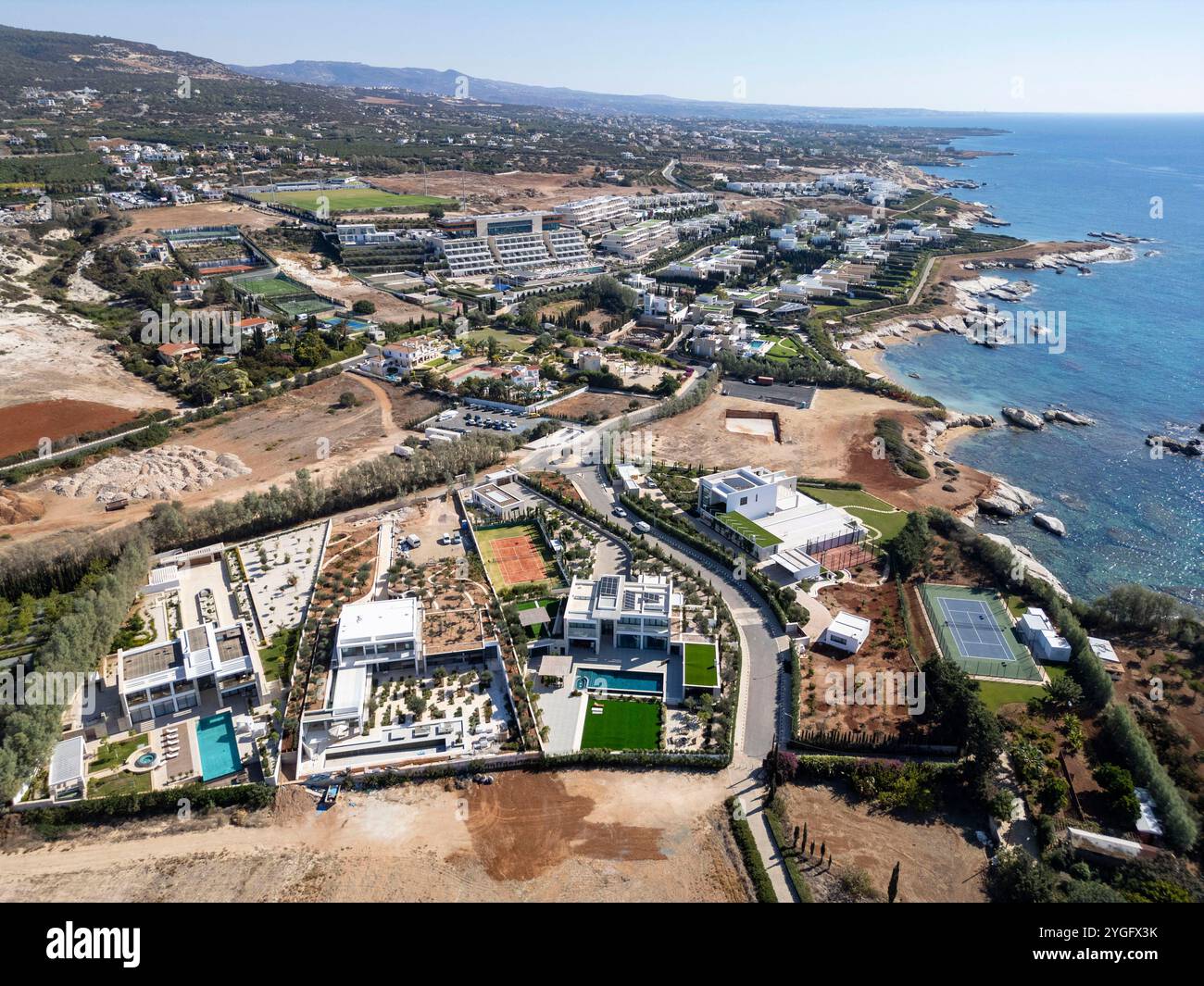 Aerial view of luxury villas by the sea at Cap St. Georges Beach Club ...
