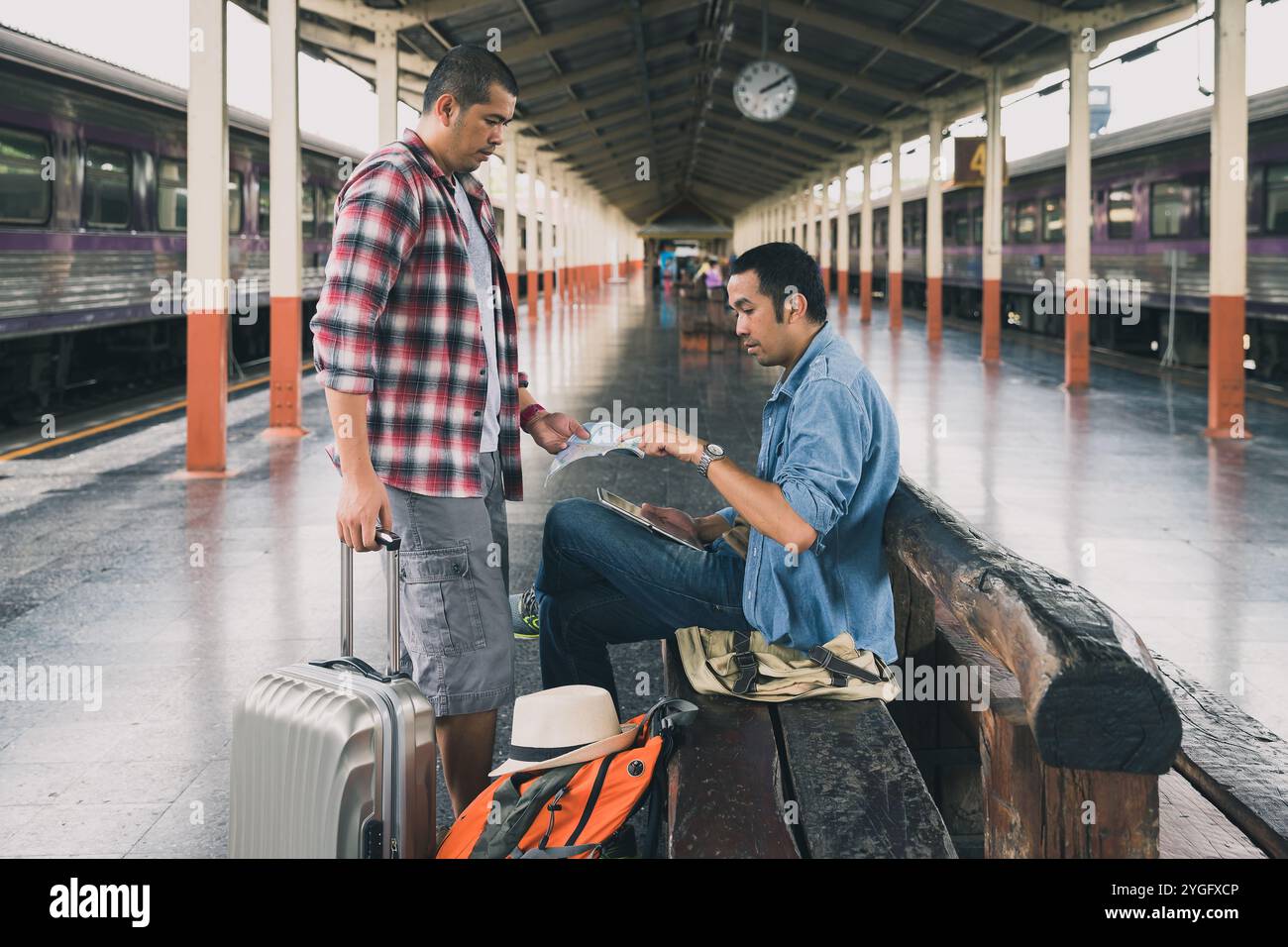 Tourist with backpack wait for train and ask for direction help Stock ...