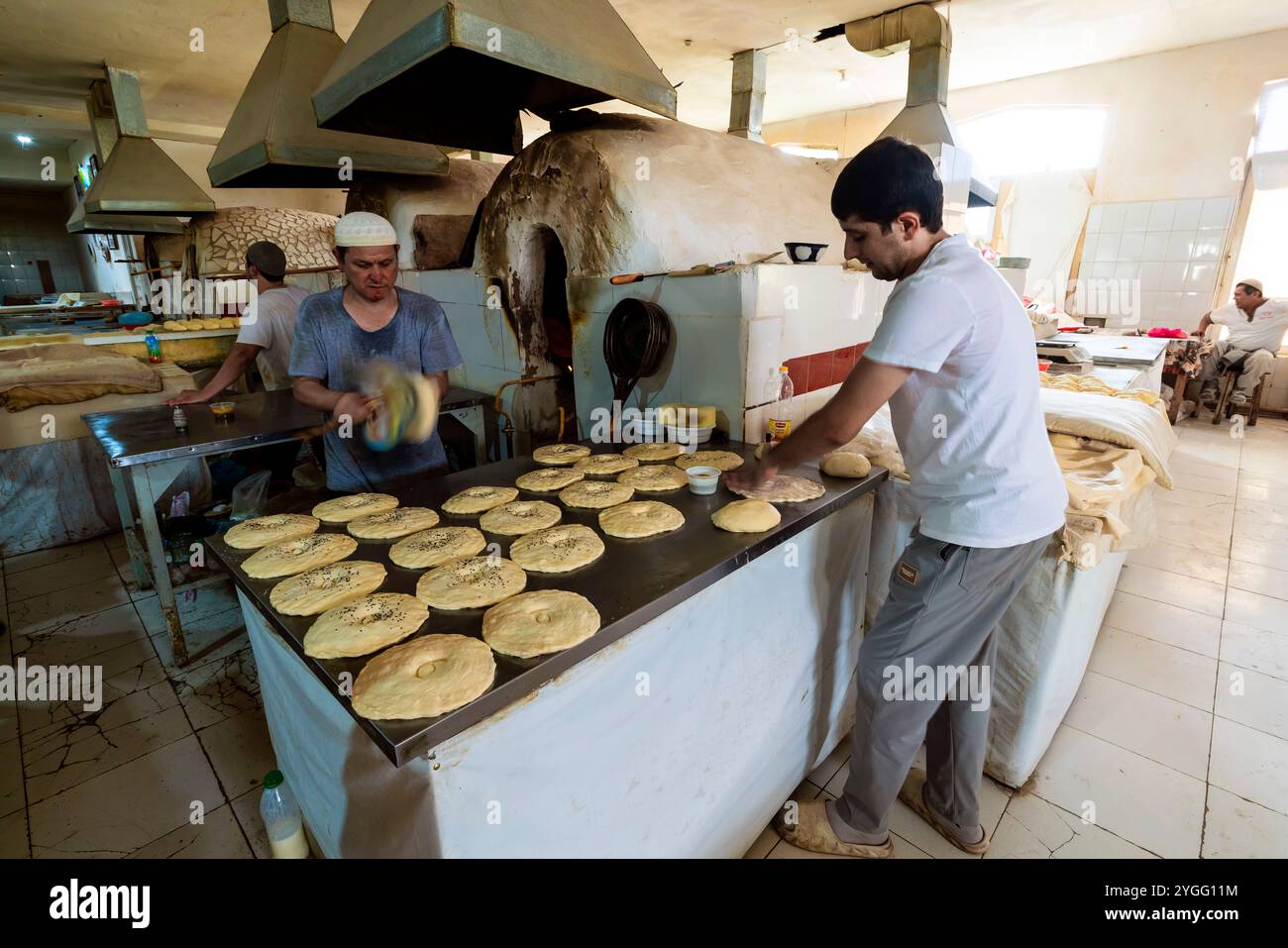 Baking local bread at Chorsu Bazaar. Chorsu Bazaar is large, enduring ...