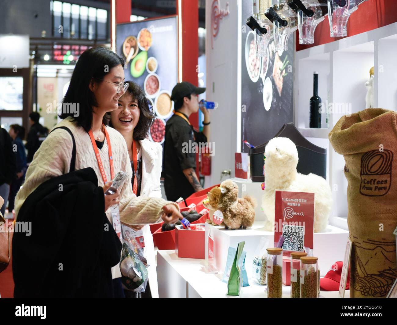 Shanghai. 7th Nov, 2024. People visit the booth of Peru during the 7th ...